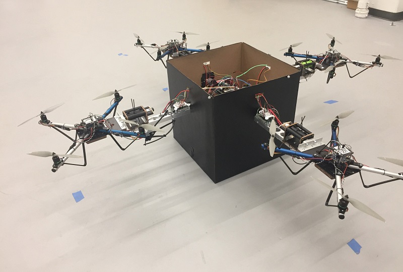 Scientists find way to coordinate several drones to deliver heavy packages