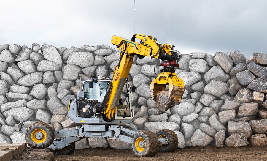 Revolutionary robot excavator builds a massive stone wall